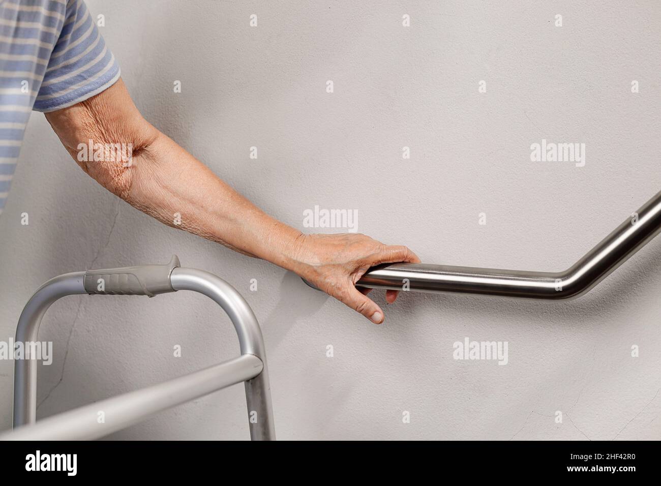Woman hand hold on handrails hi-res stock photography and images - Alamy