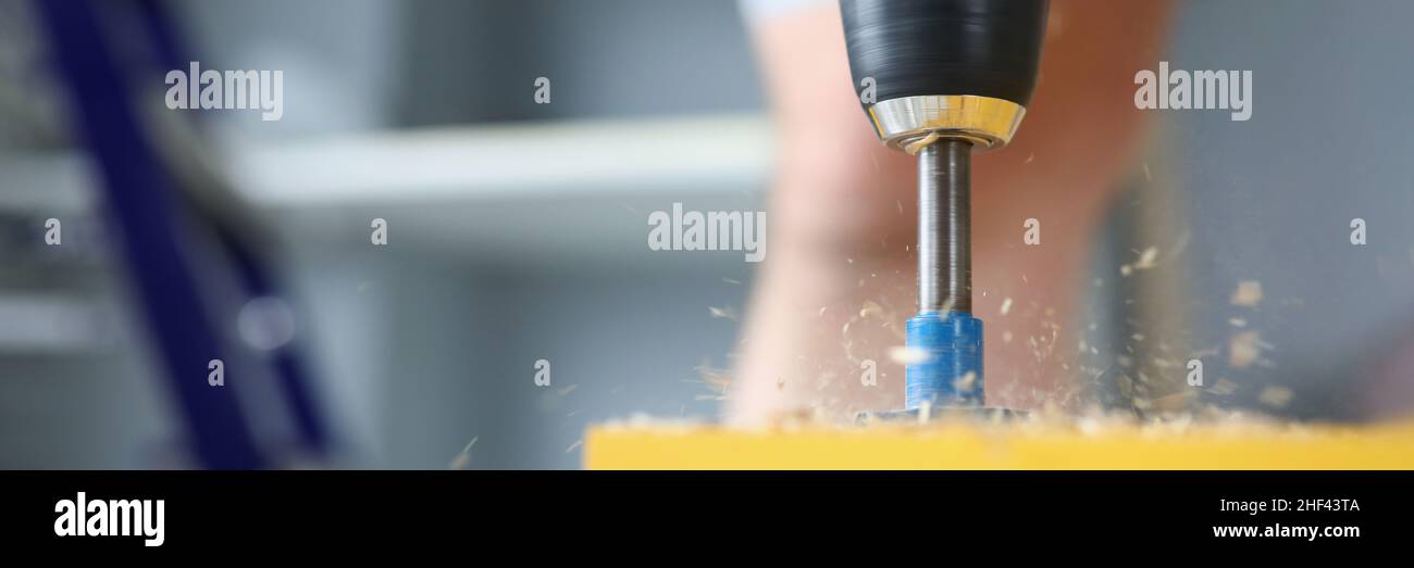 Professional worker using tool Stock Photo - Alamy