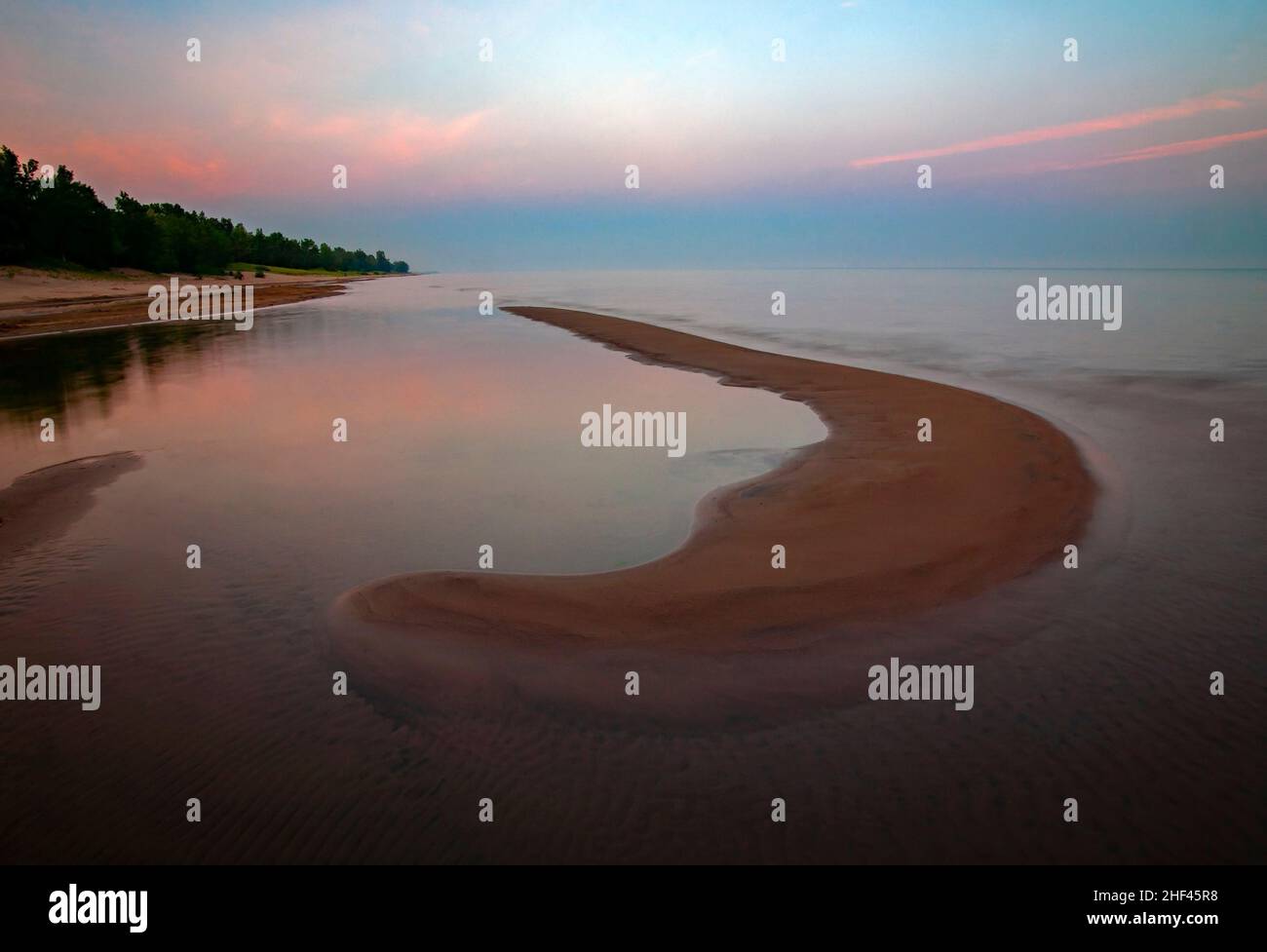 A sandbar at sunset off shore on Lake Erie at Long Point Poinr ...