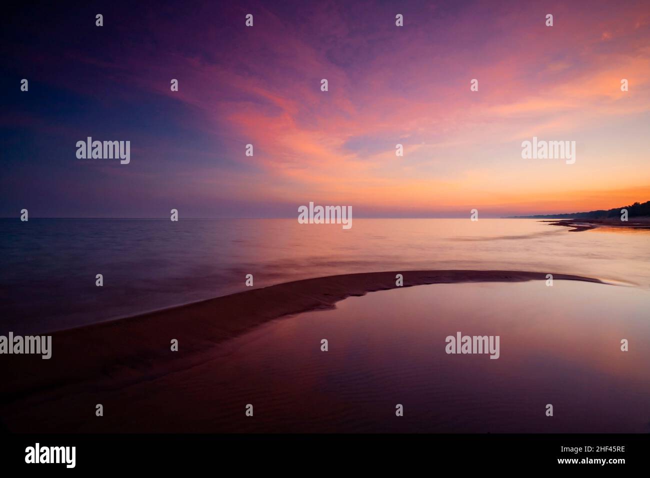 A sandbar at sunset off shore on Lake Erie at Long Point Poinr ...