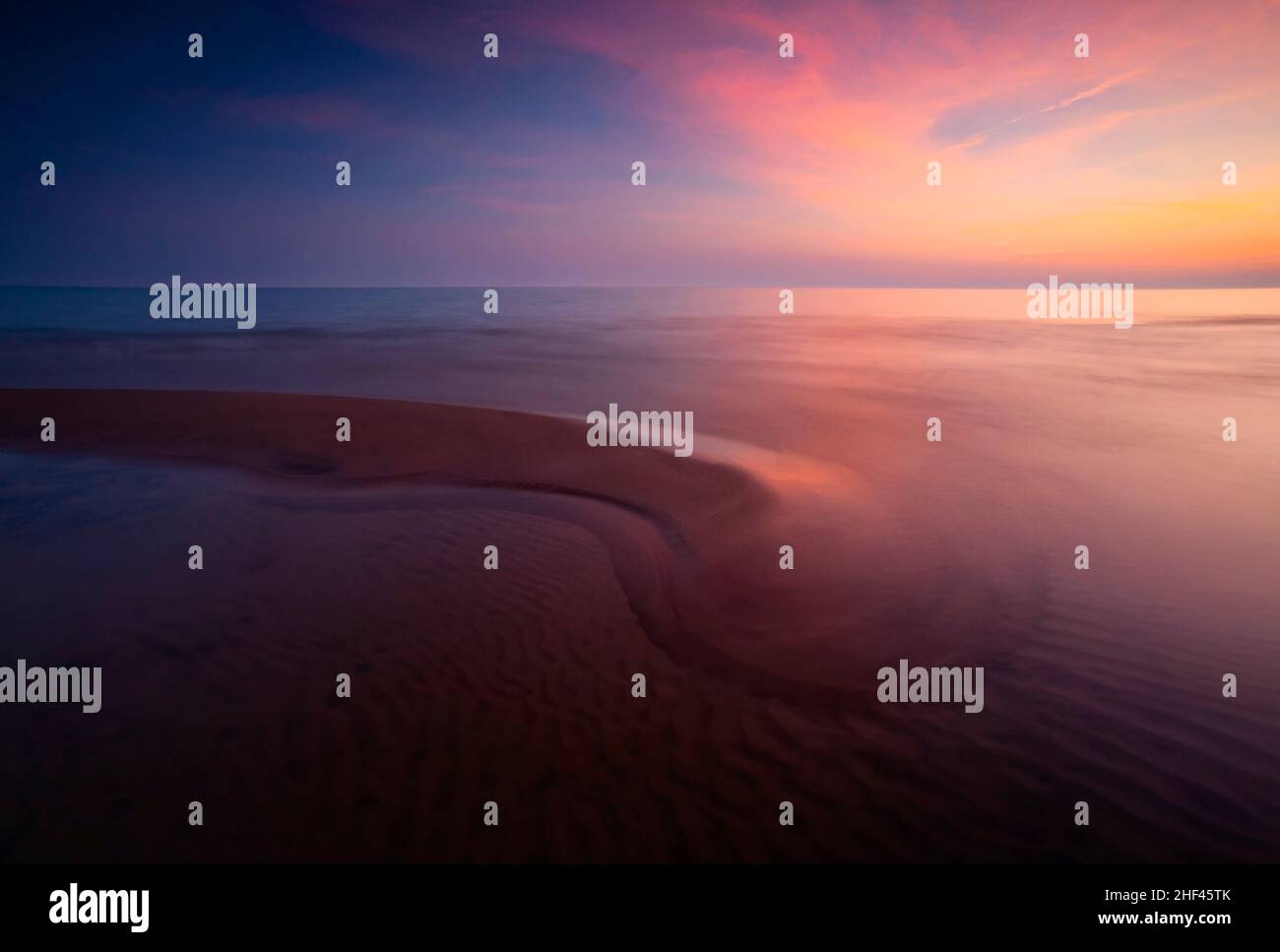 A sandbar at sunset off shore on Lake Erie at Long Point Poinr ...