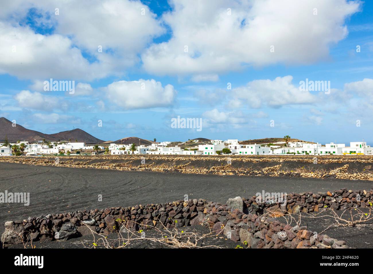 appartments with palm tree in Yaiza, Spain built in volcanic area Stock ...
