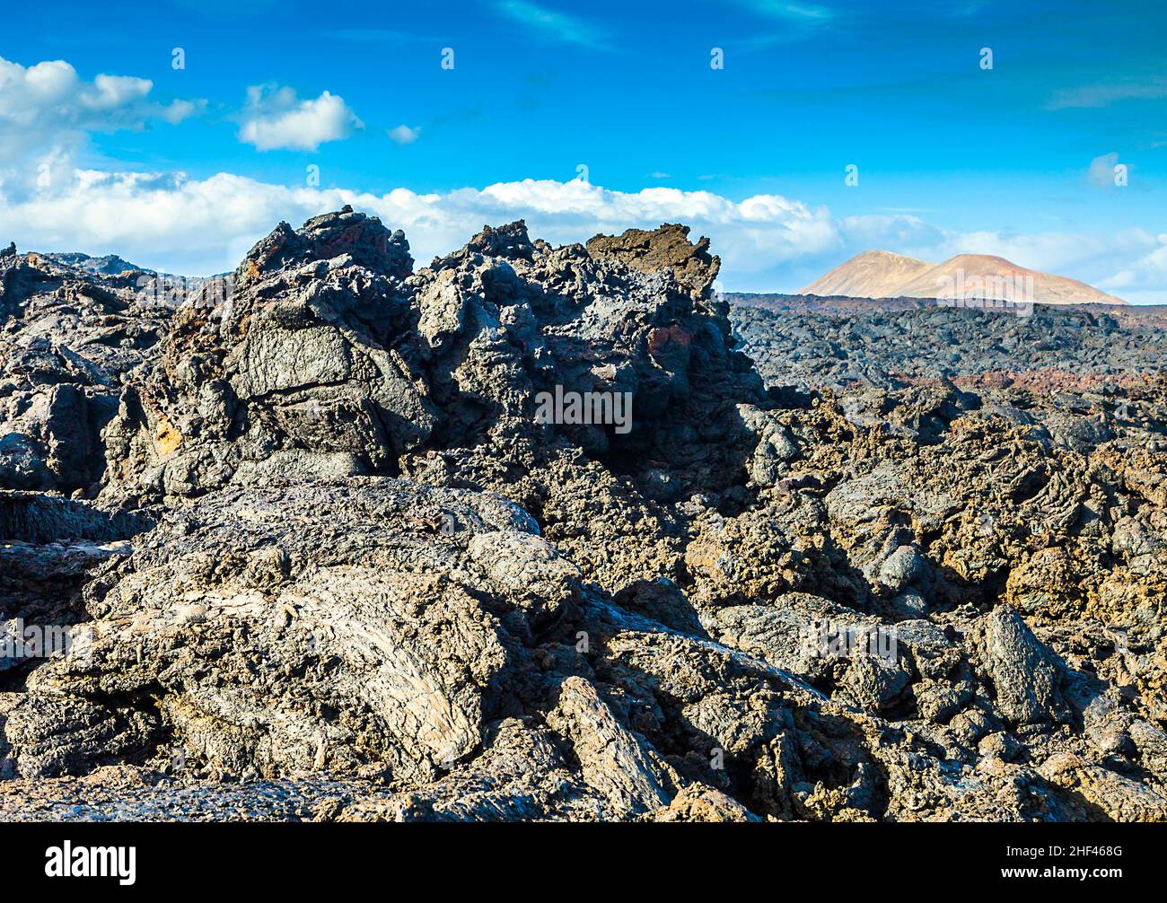 Stones of volcanic flow give a beautiful natural structure Stock Photo ...