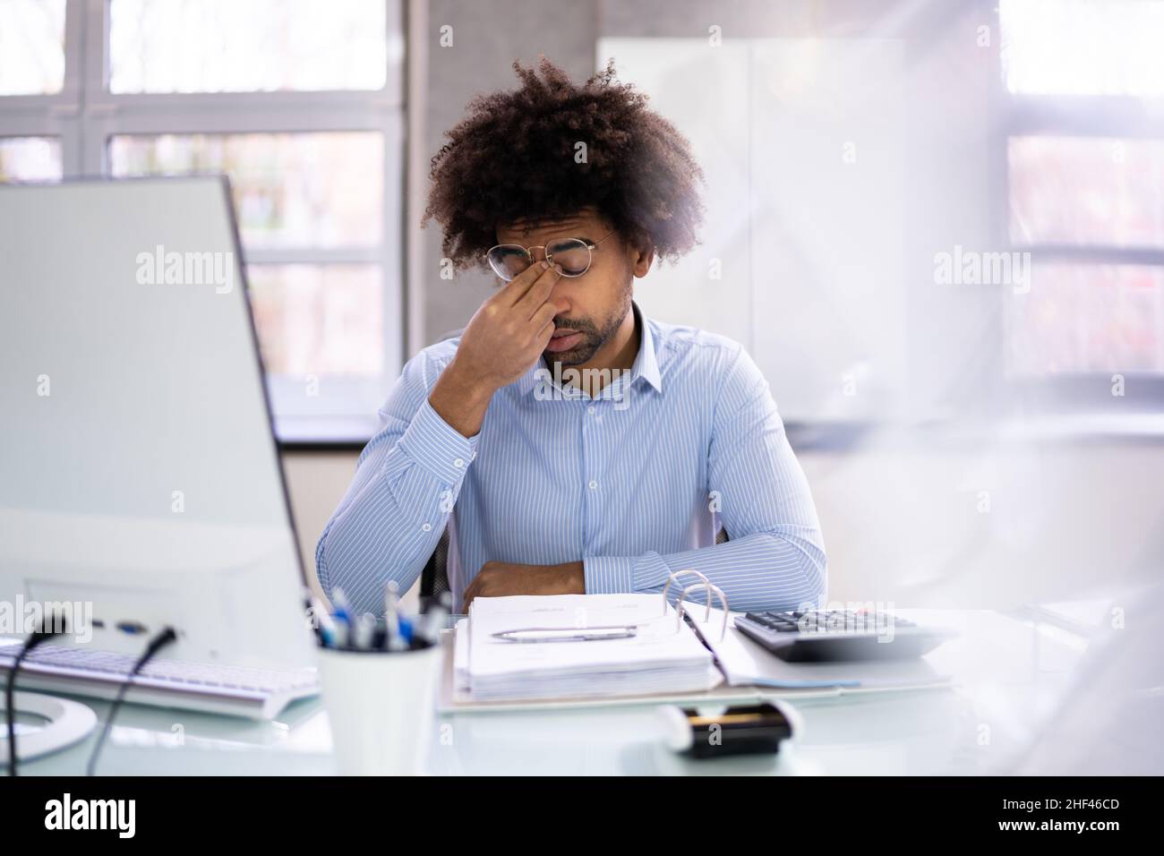 Young stressed african man using hi-res stock photography and images ...