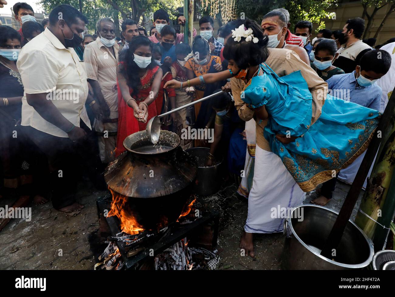 Providing devotees hi-res stock photography and images - Alamy