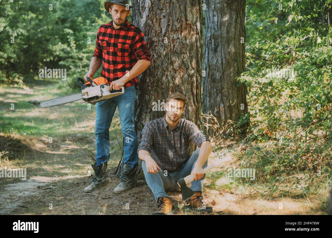 Brutal lumberjacks. Cutting wood. Brutality and masculinity. Lumberjack ...