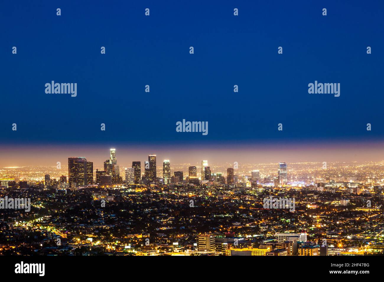 skyline of Los Angeles by night with blue dark sky Stock Photo - Alamy