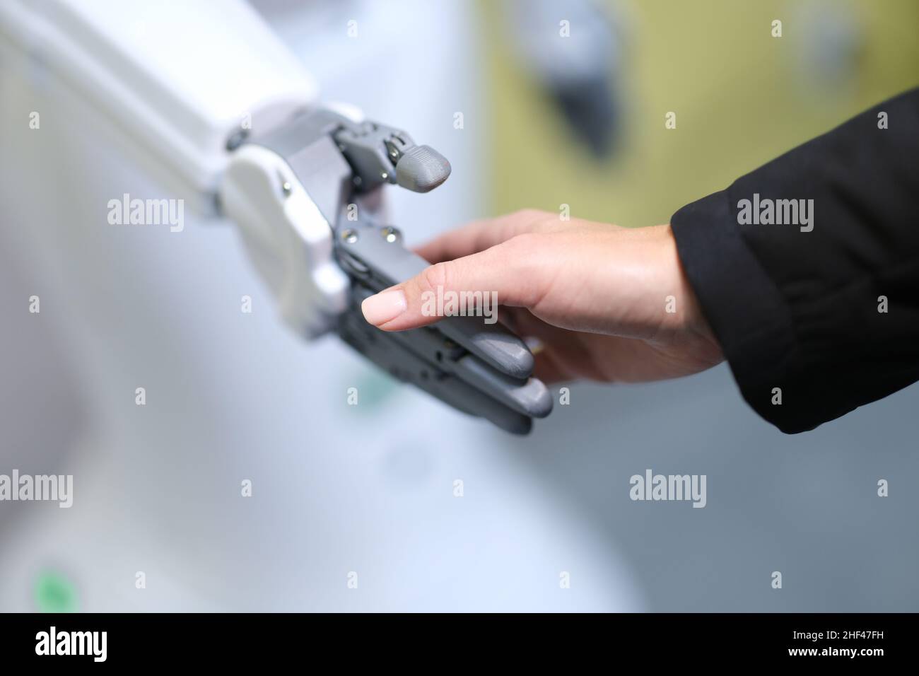 Human and robot handshake, technology of the future Stock Photo - Alamy Human and robot handshake, technology of the future Stock Photo - Alamy