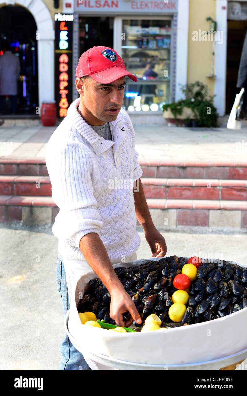 Street Vendor selling fresh mussels by the Golden horn in Beyoğlu ...