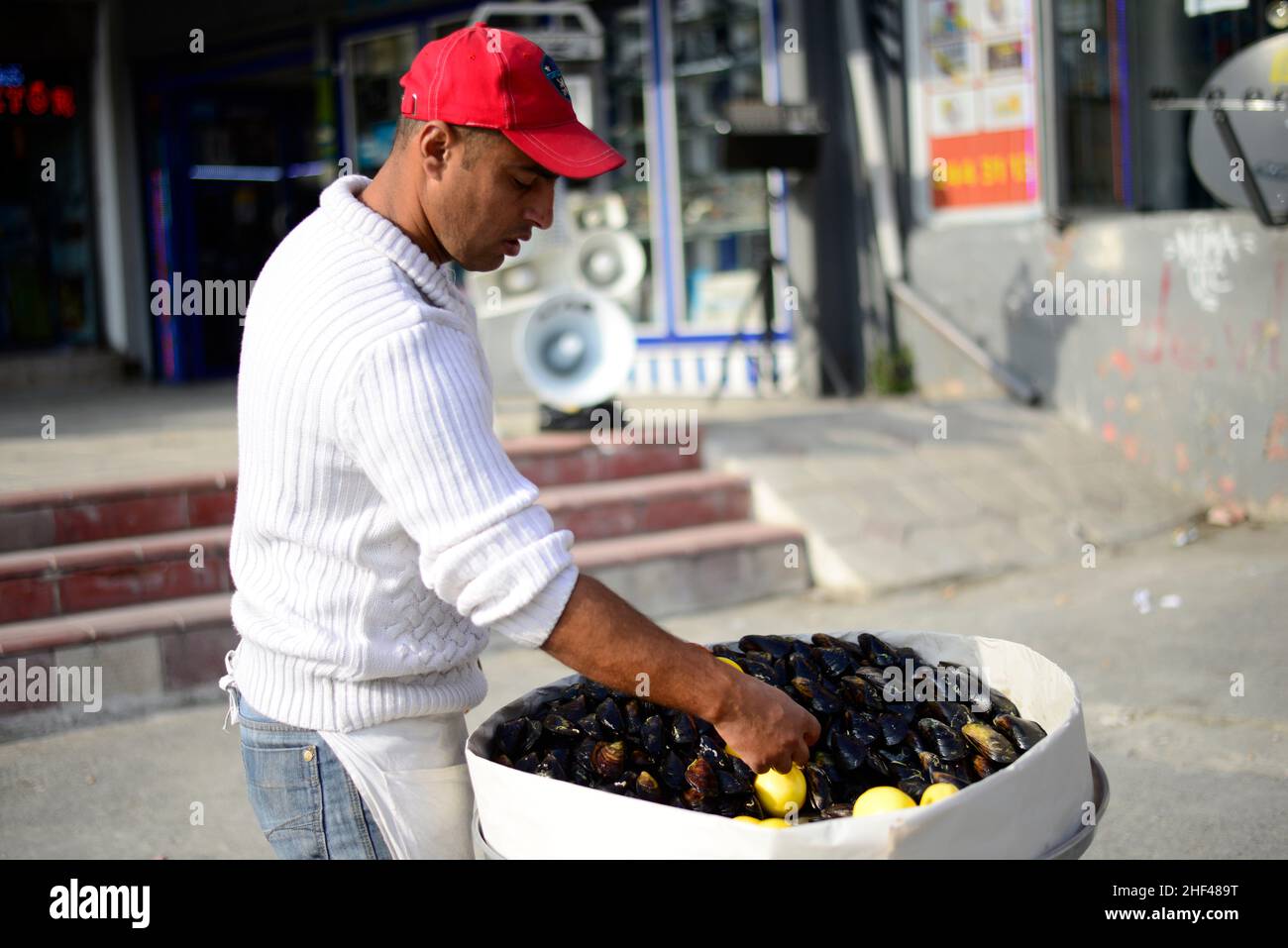 Street Vendor selling fresh mussels by the Golden horn in Beyoğlu ...