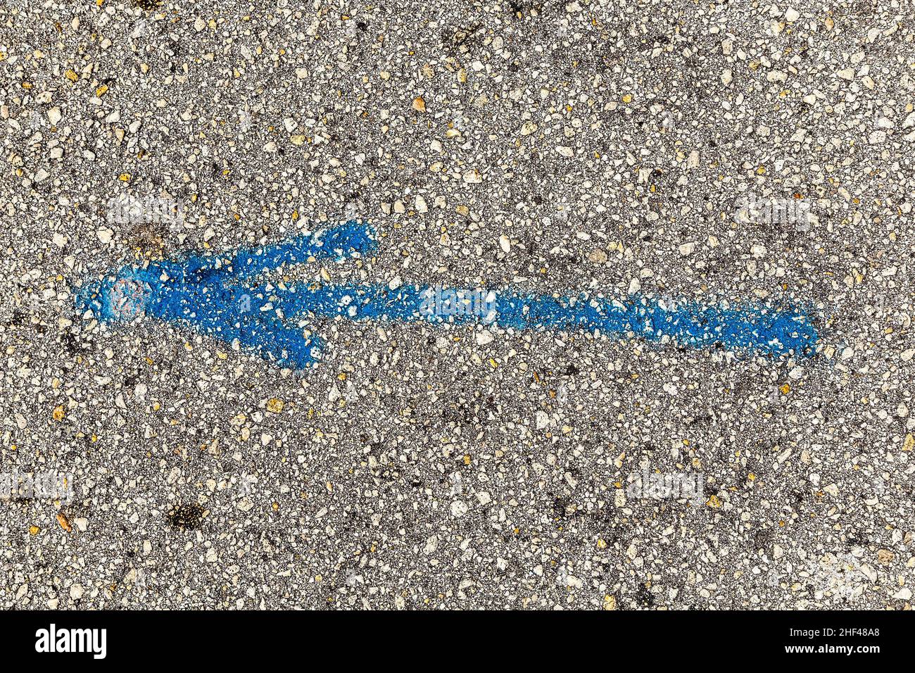 old road marking arrow in green color Stock Photo - Alamy
