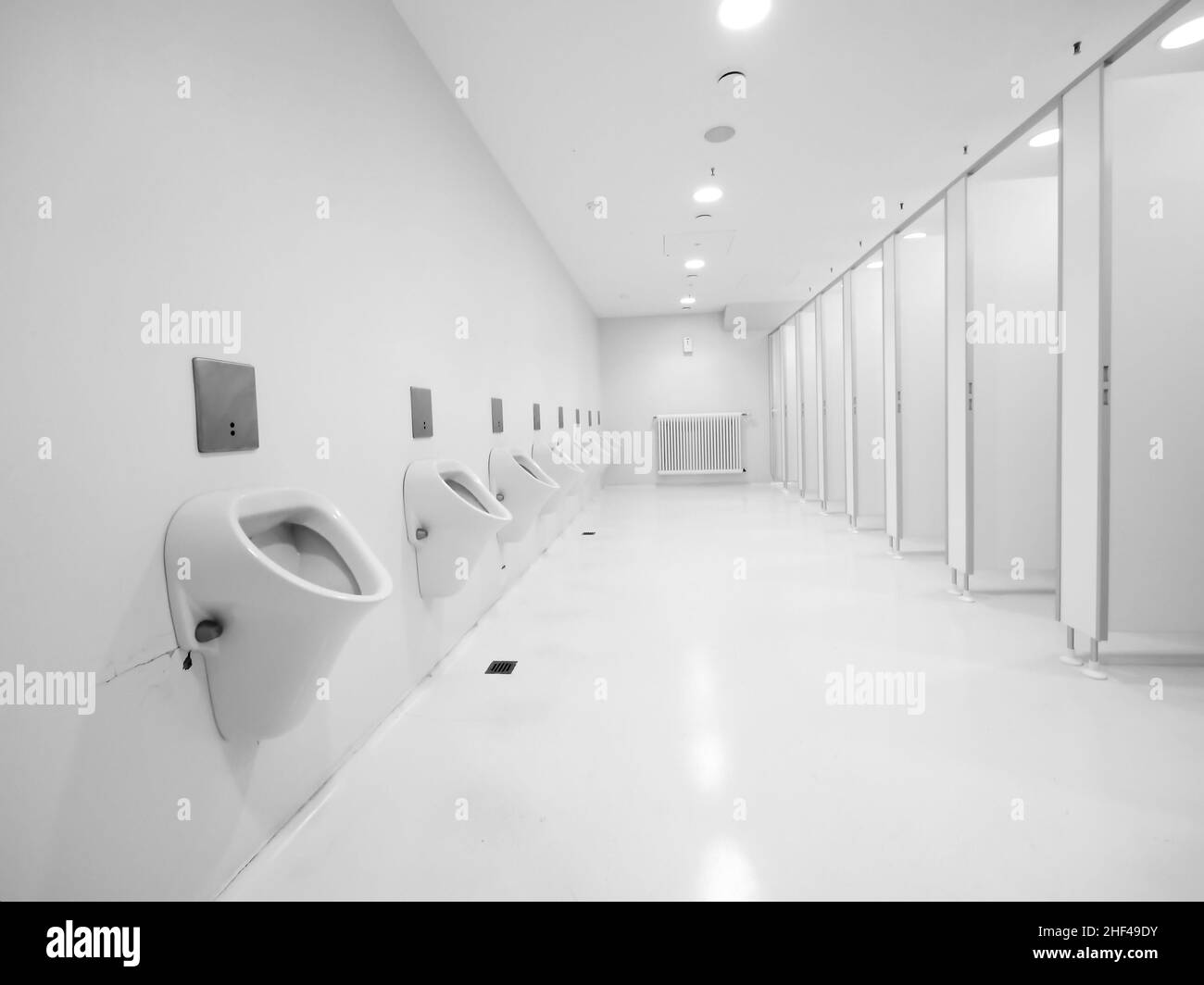 a clean new public toilet room empty Stock Photo - Alamy