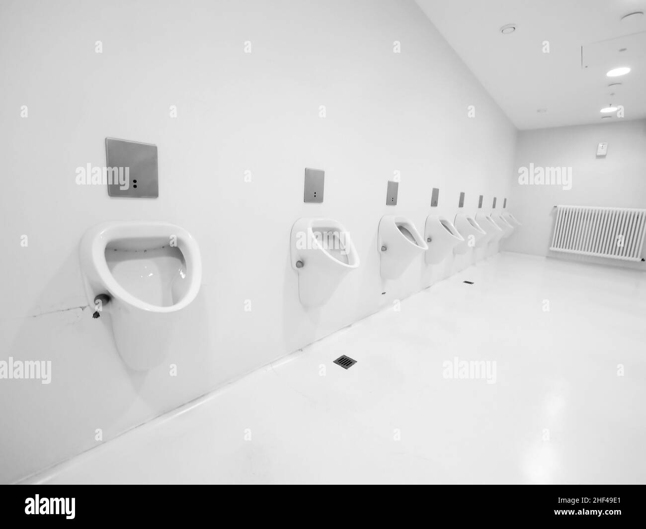 a clean new public toilet room empty Stock Photo - Alamy