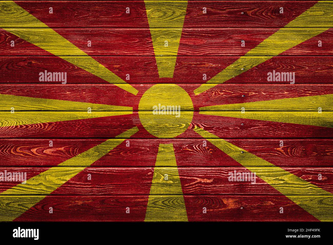 The national flag of Macedonia is painted on a camp of even boards ...