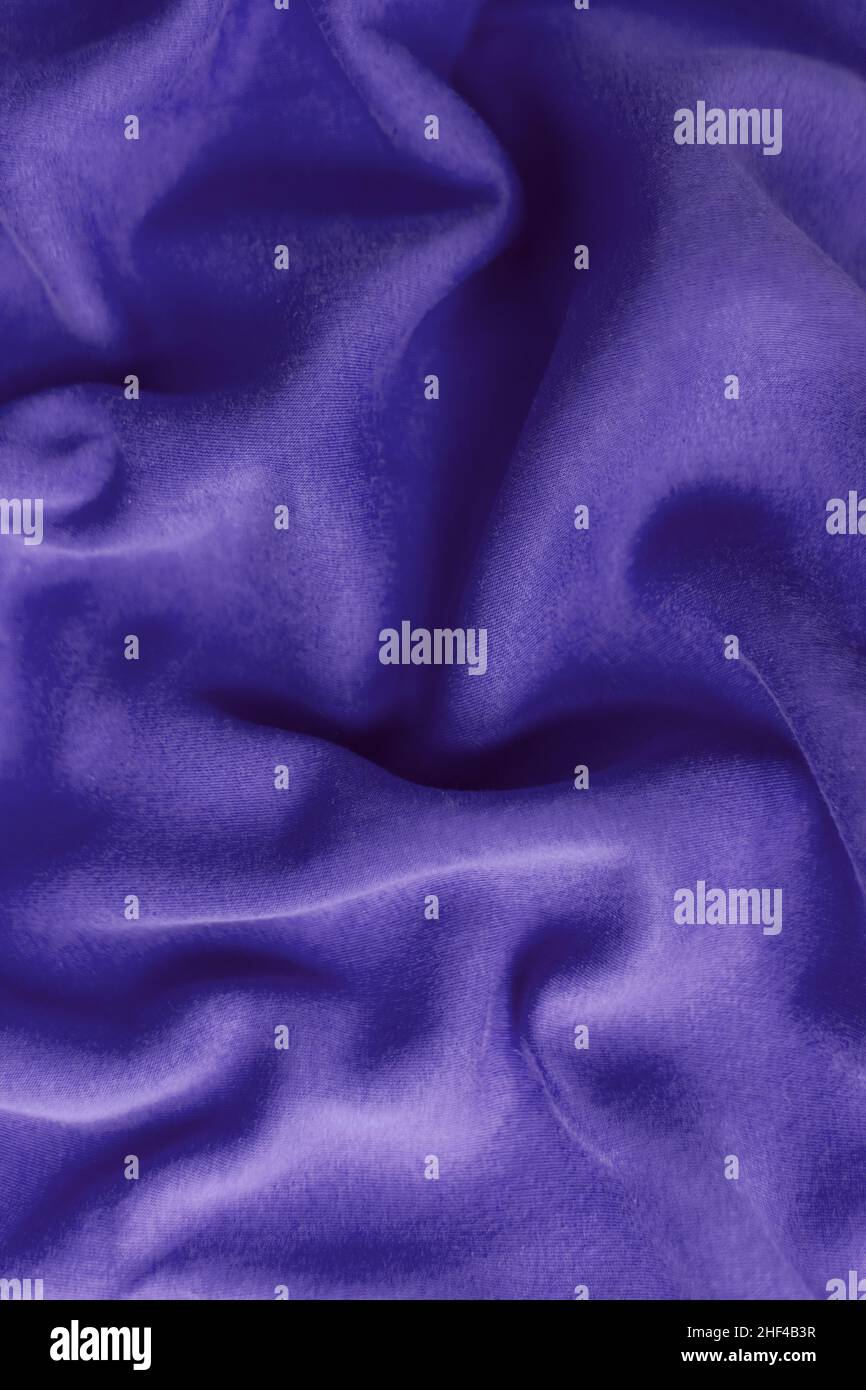 Fabric with waves colored in violet color of the year 2022. Trendy ...