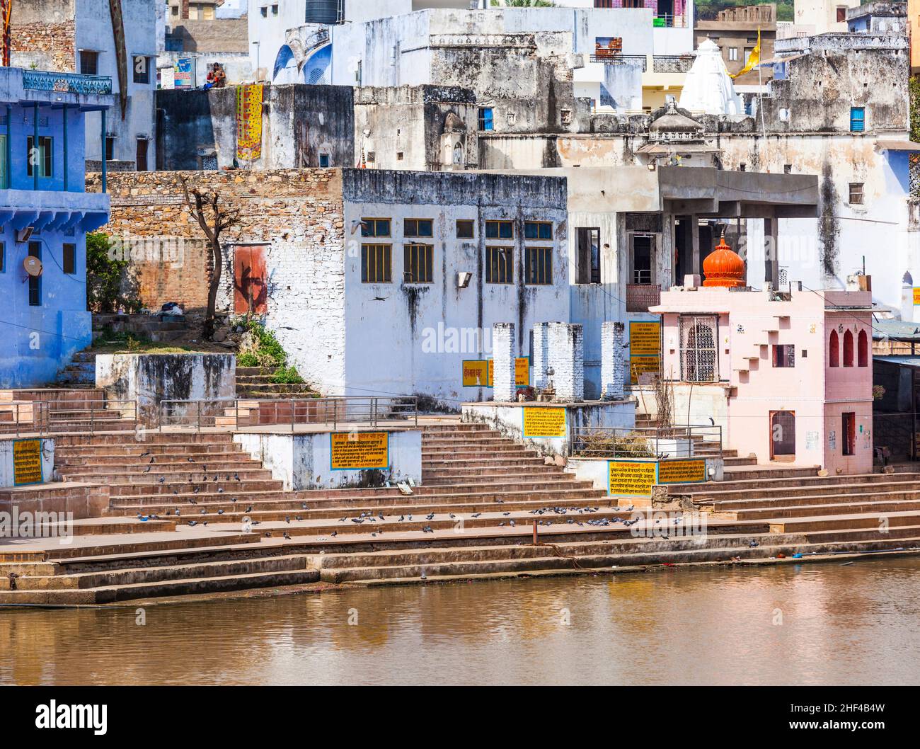ritual bathing place in holy lake in Pushkar, Rajasthan, India without ...