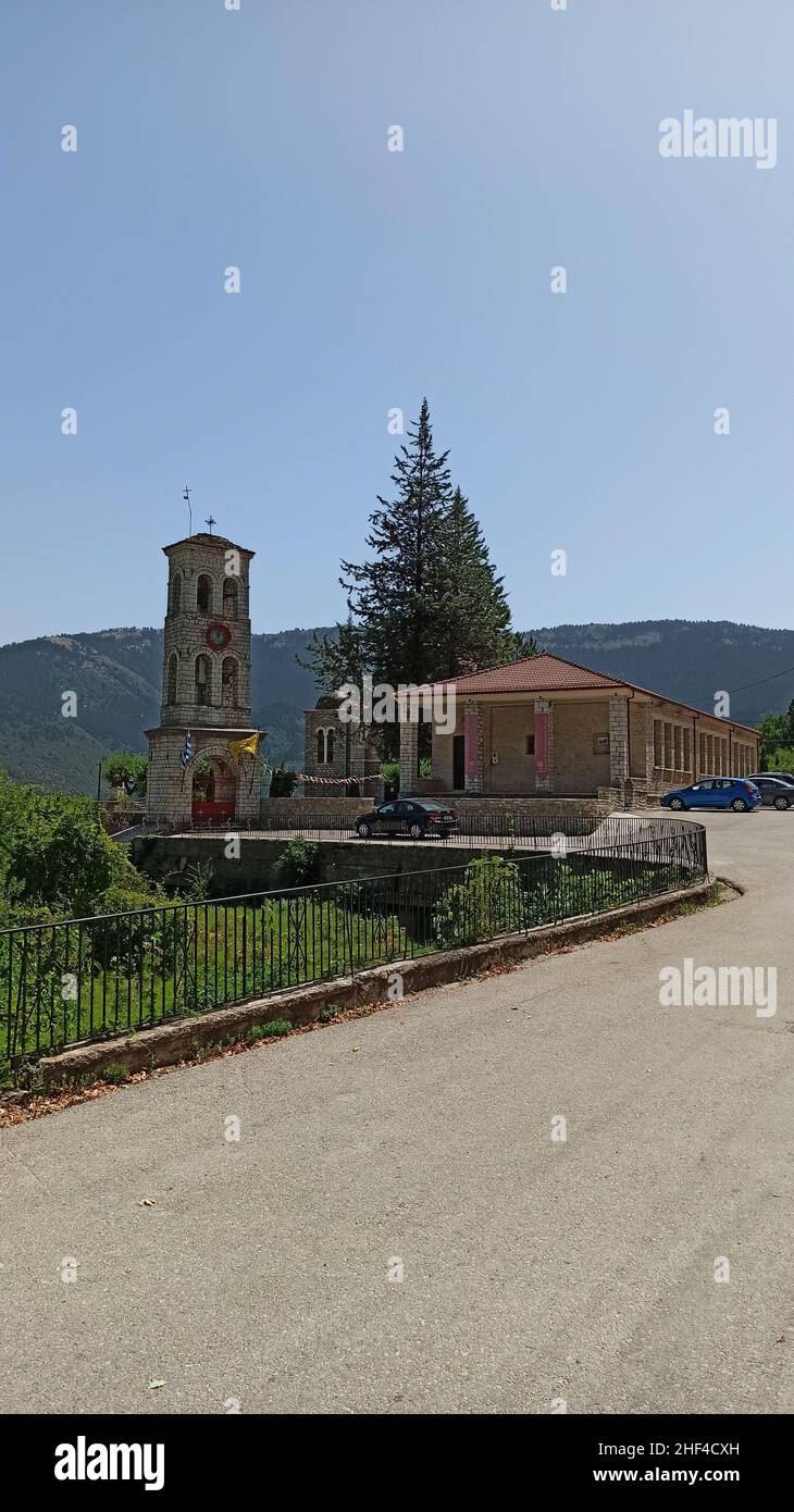 The bell tower in Mikro Chorio village at Karpenisi Greece Stock Photo ...