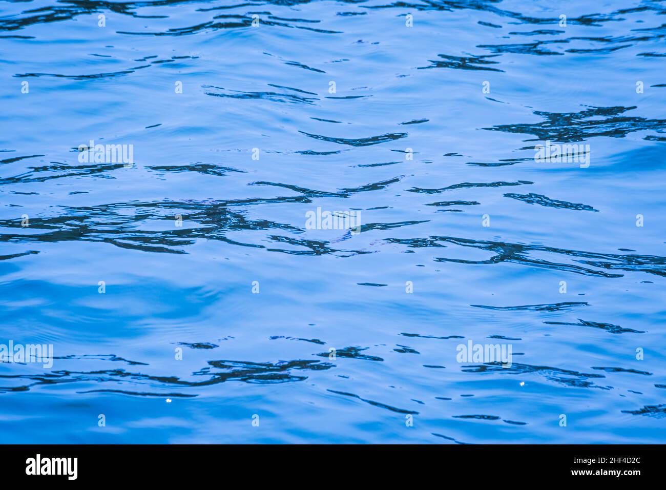 Colorful patterns of water reflection background Stock Photo - Alamy