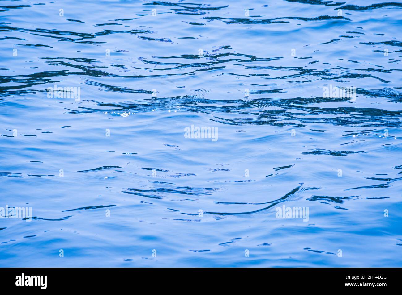 Colorful patterns of water reflection background Stock Photo - Alamy