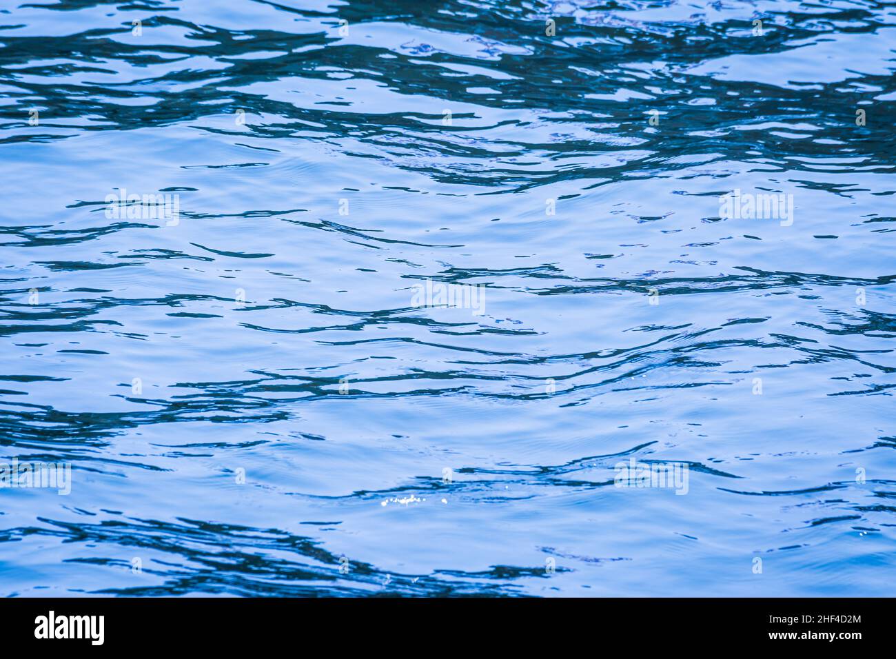 Colorful patterns of water reflection background Stock Photo - Alamy