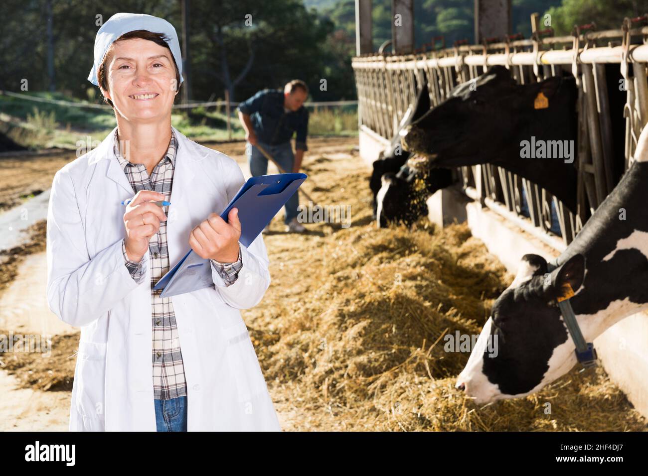 Portrait of woman quality expert who is standing Stock Photo - Alamy