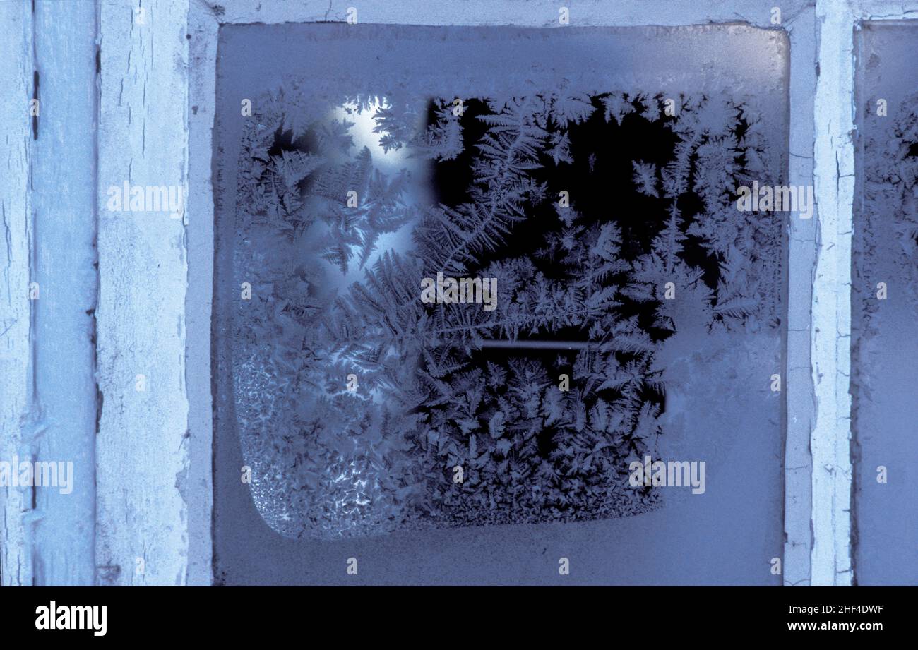 Frosty window seen fram the outside, analog. Icy glass with pattern and ...