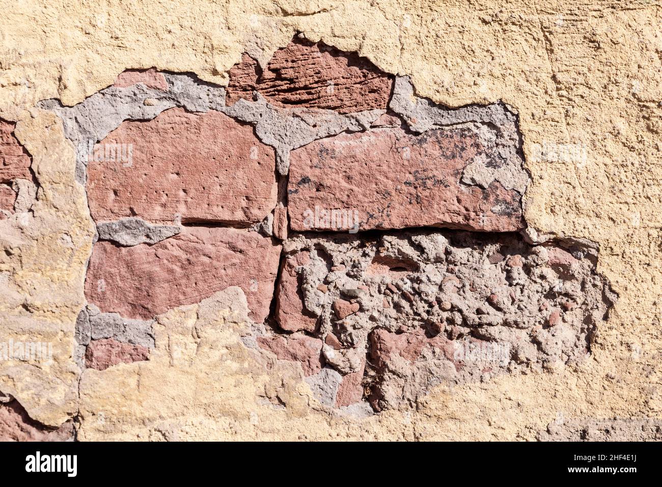 old brick wall with damaged plaster Stock Photo - Alamy