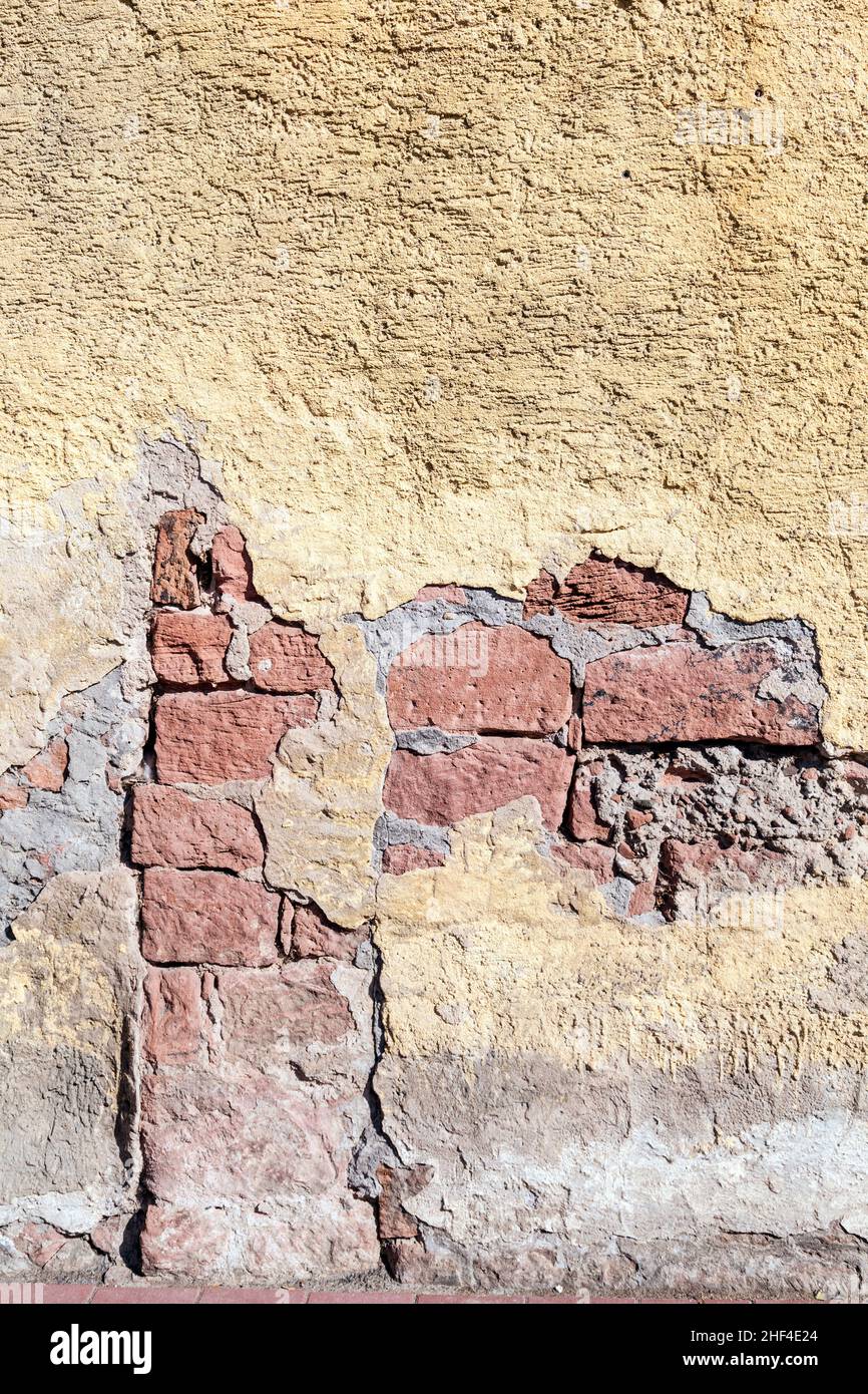 old brick wall with damaged plaster Stock Photo - Alamy