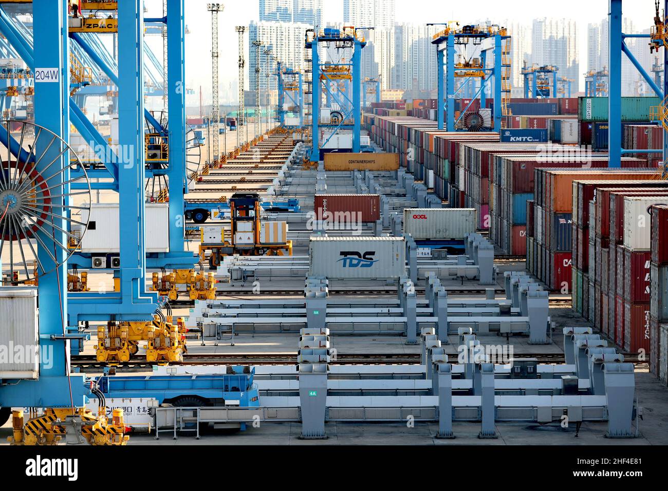 QINGDAO, CHINA - JANUARY 14, 2022 - An automatic pilot vehicle delivers ...
