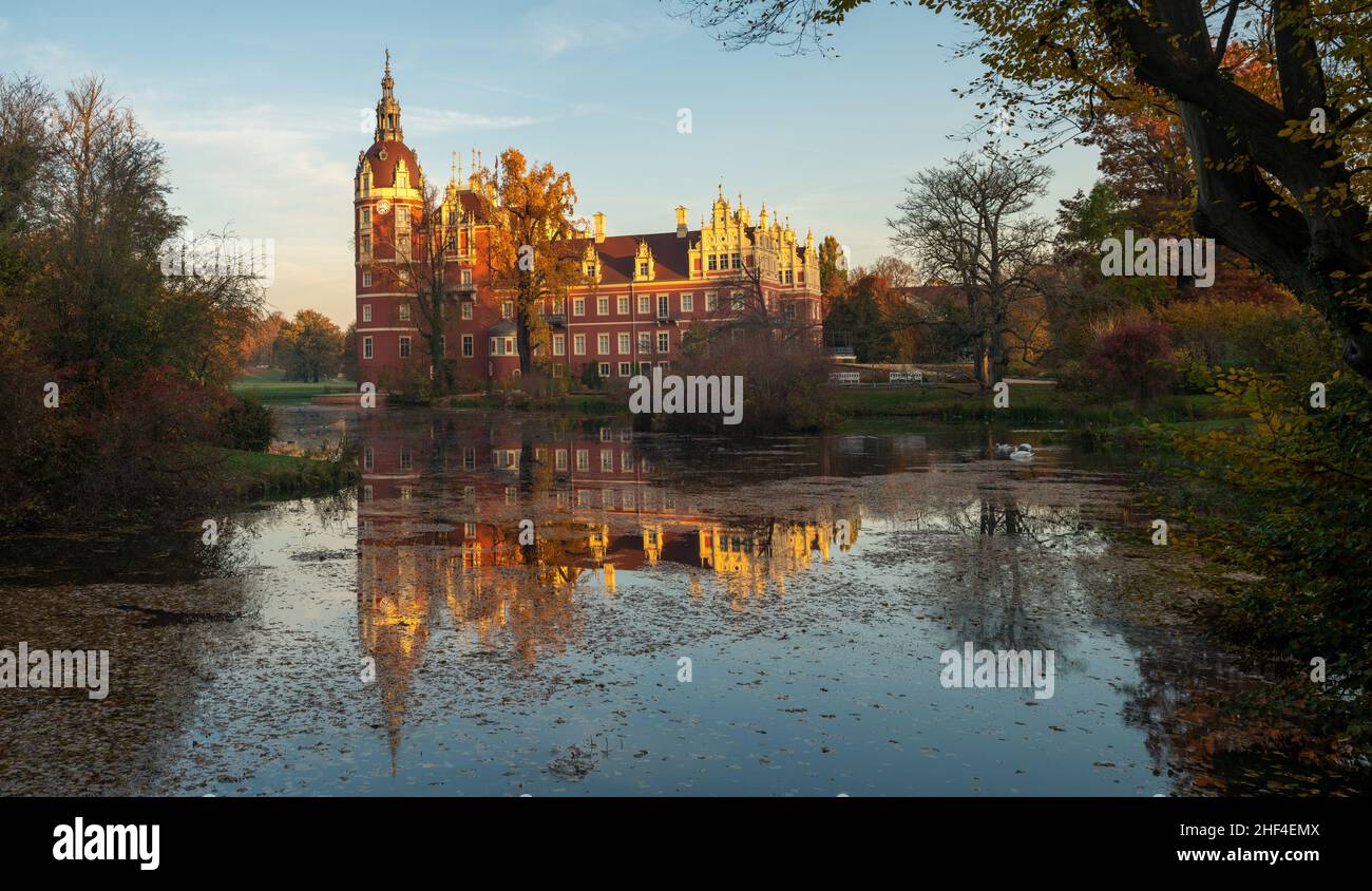 Bad Muskau Castle with a mirror reflection in the lake Stock Photo - Alamy