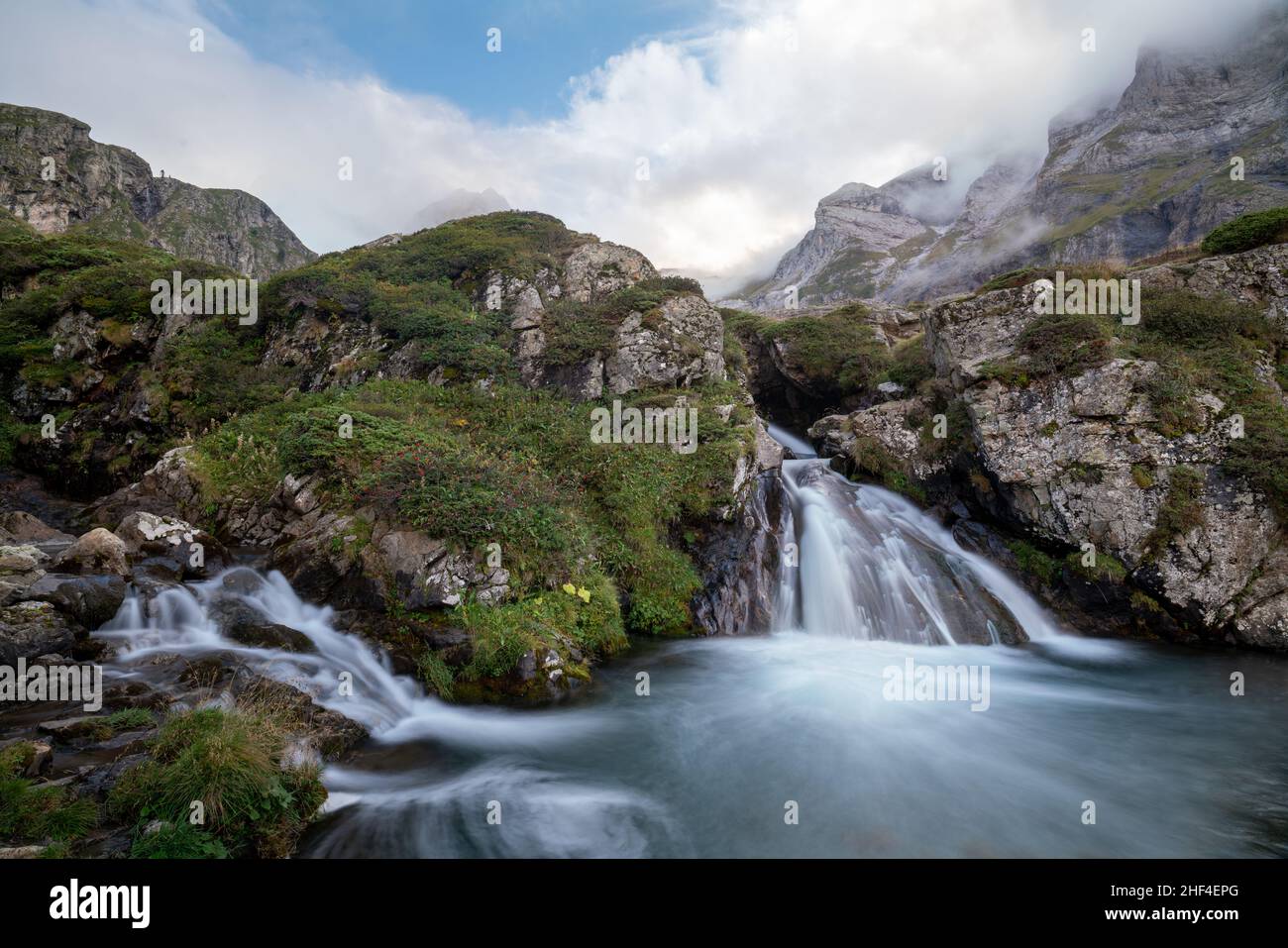 Cascades of the waterfall flowing from the ice circus in the French ...