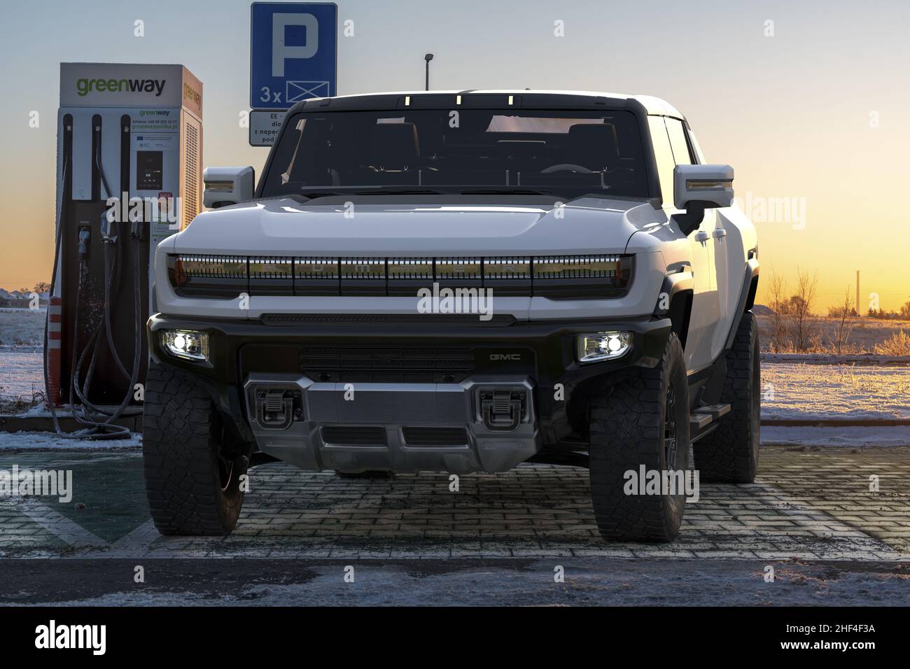 GMC HUMMER EV PICKUP at Greenway fast charging station on a frosty ...