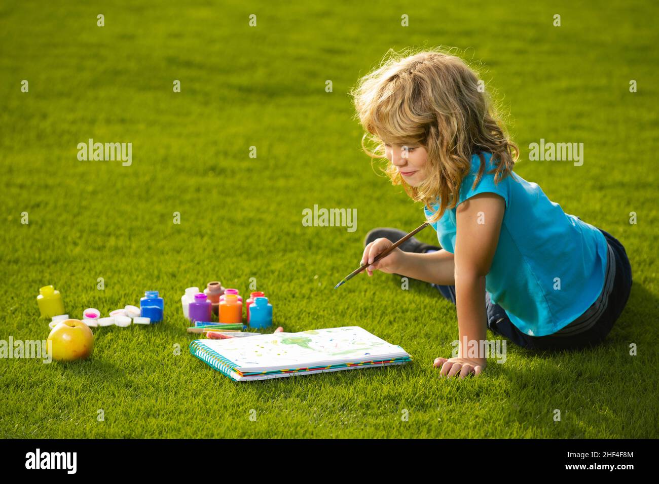 Kids painting drawing art. Child boy enjoying art and craft drawing in ...