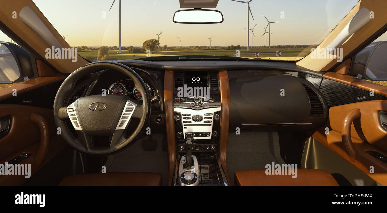 The steering wheel and dashboard of the Infiniti QX80 luxury SUV Stock ...