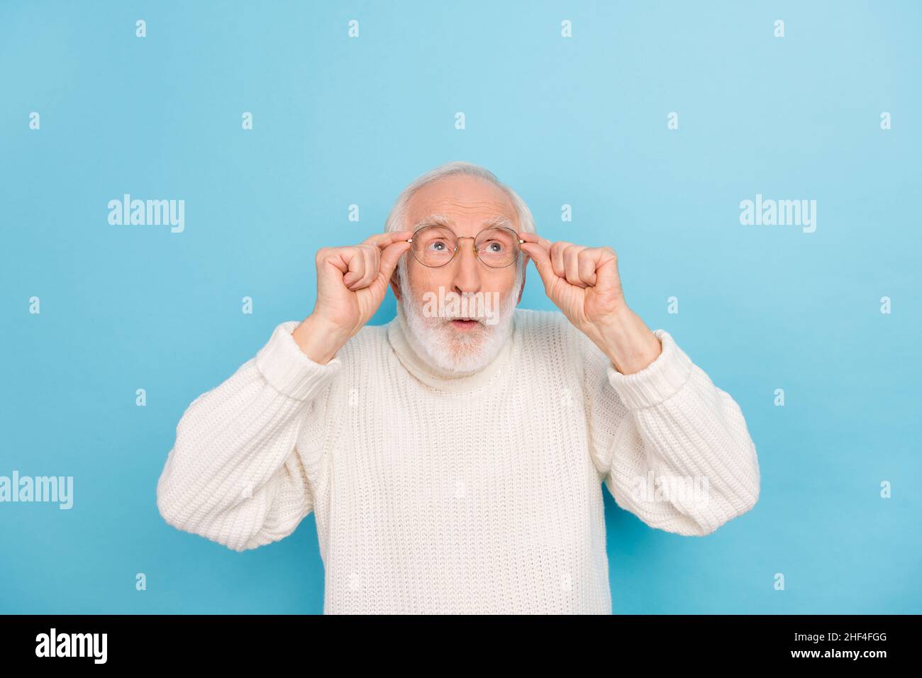 Photo of celebrate old beard man look up wear eyewear white turtleneck ...
