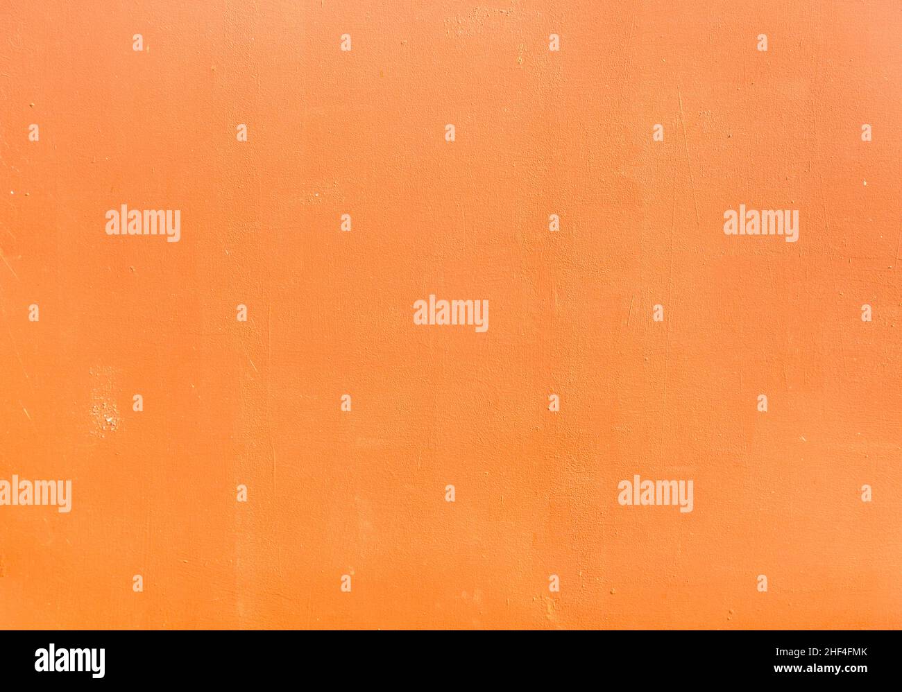 orange background with structure at a painted wall Stock Photo - Alamy
