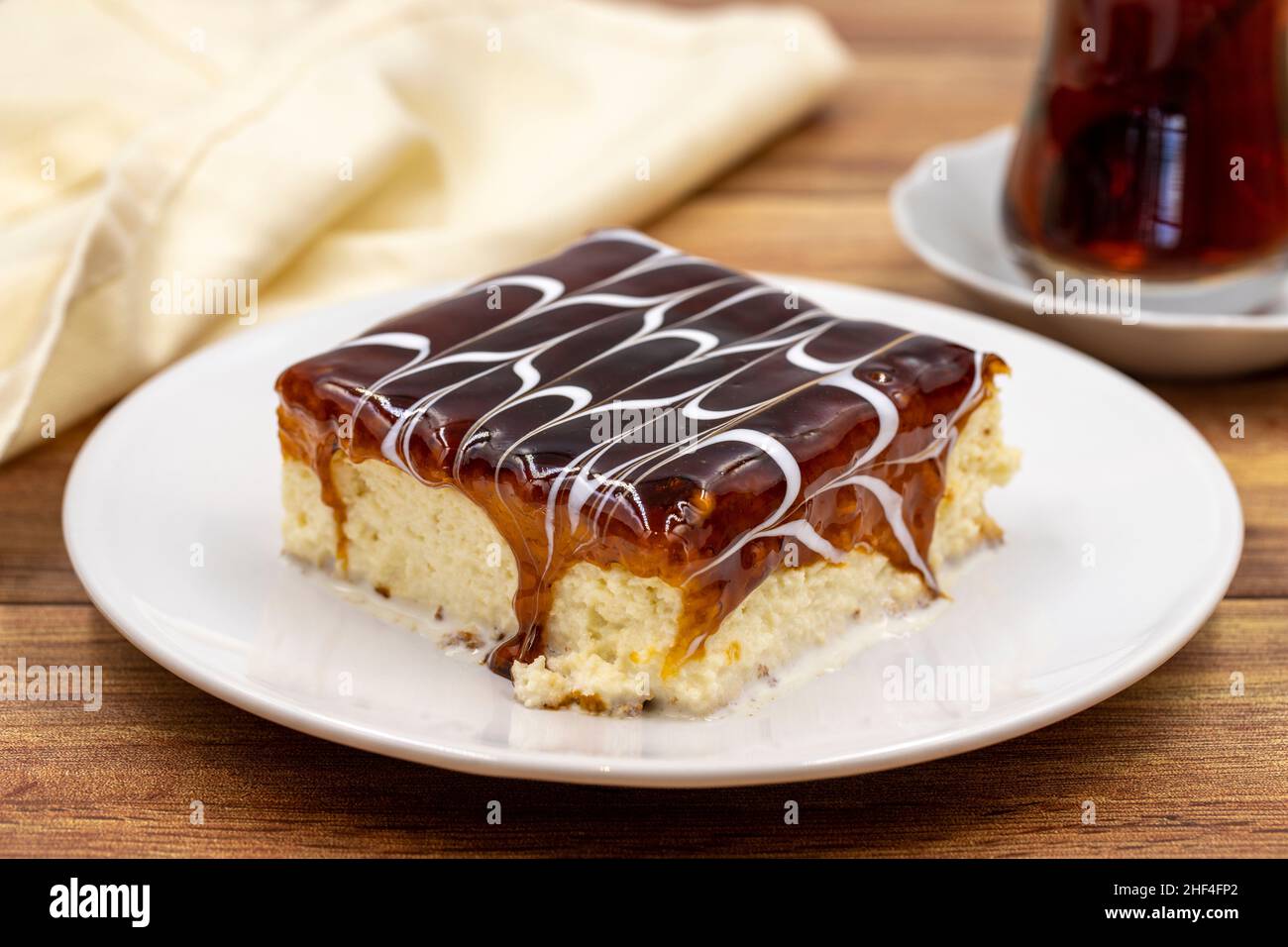 Trilece on the wooden bakground. Dessert Muhallebi Pudding with Jelly ...