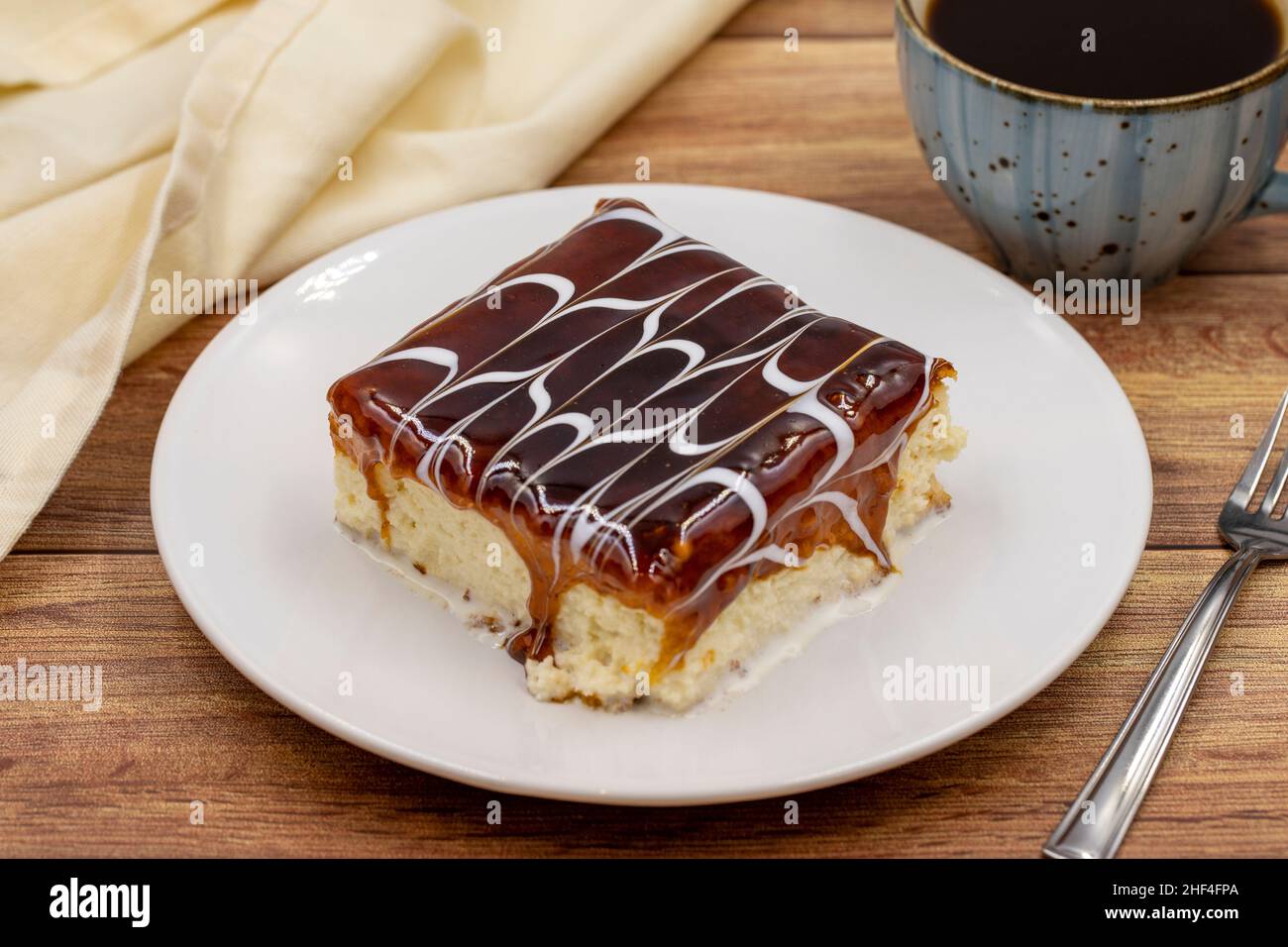 Trilece on the wooden bakground. Dessert Muhallebi Pudding with Jelly ...