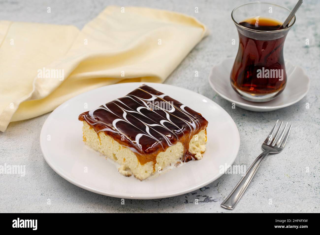 Caramel trilece dessert on stone background. Traditional Turkish ...
