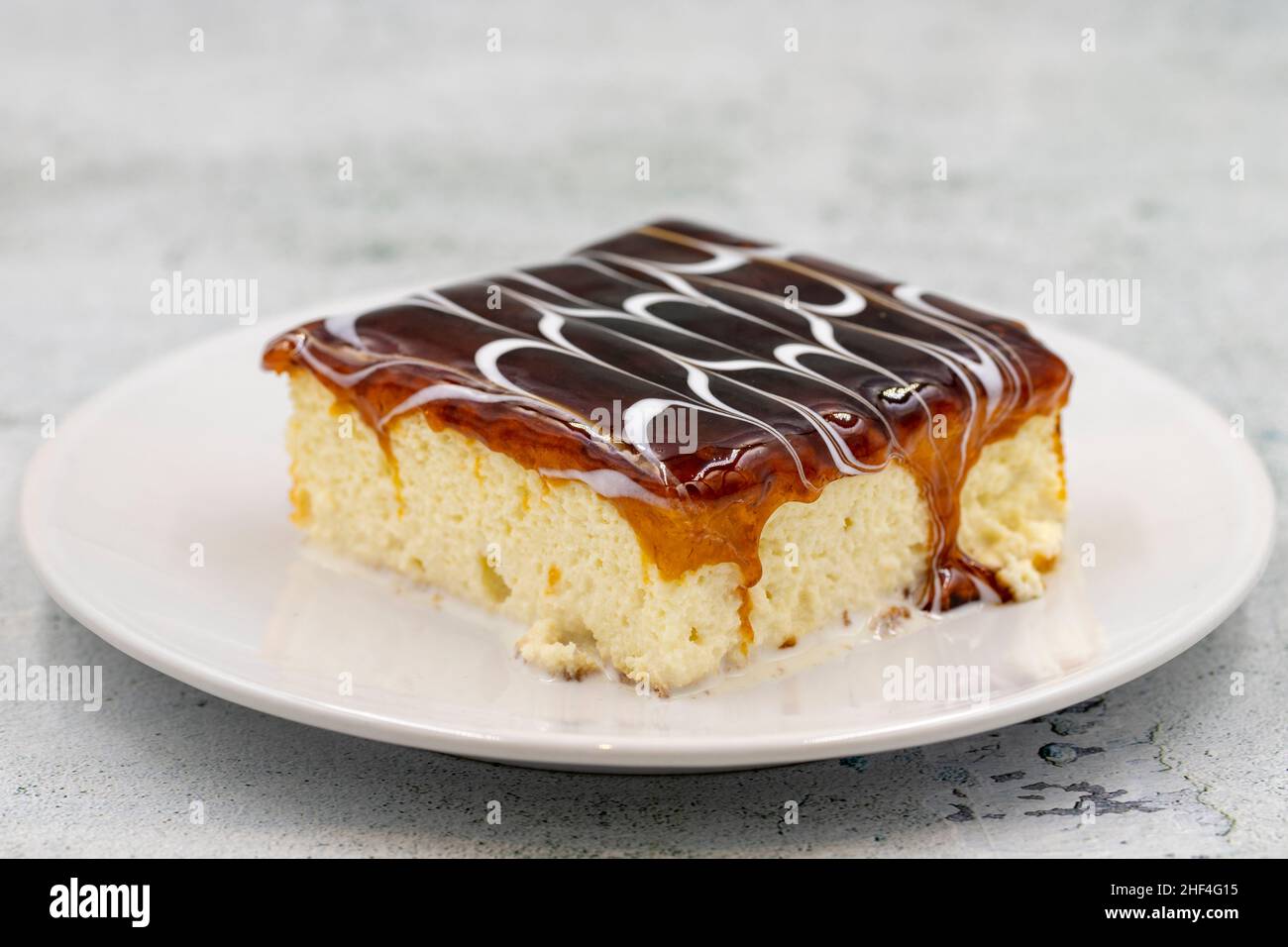 Caramel trilece dessert on stone background. Traditional Turkish ...