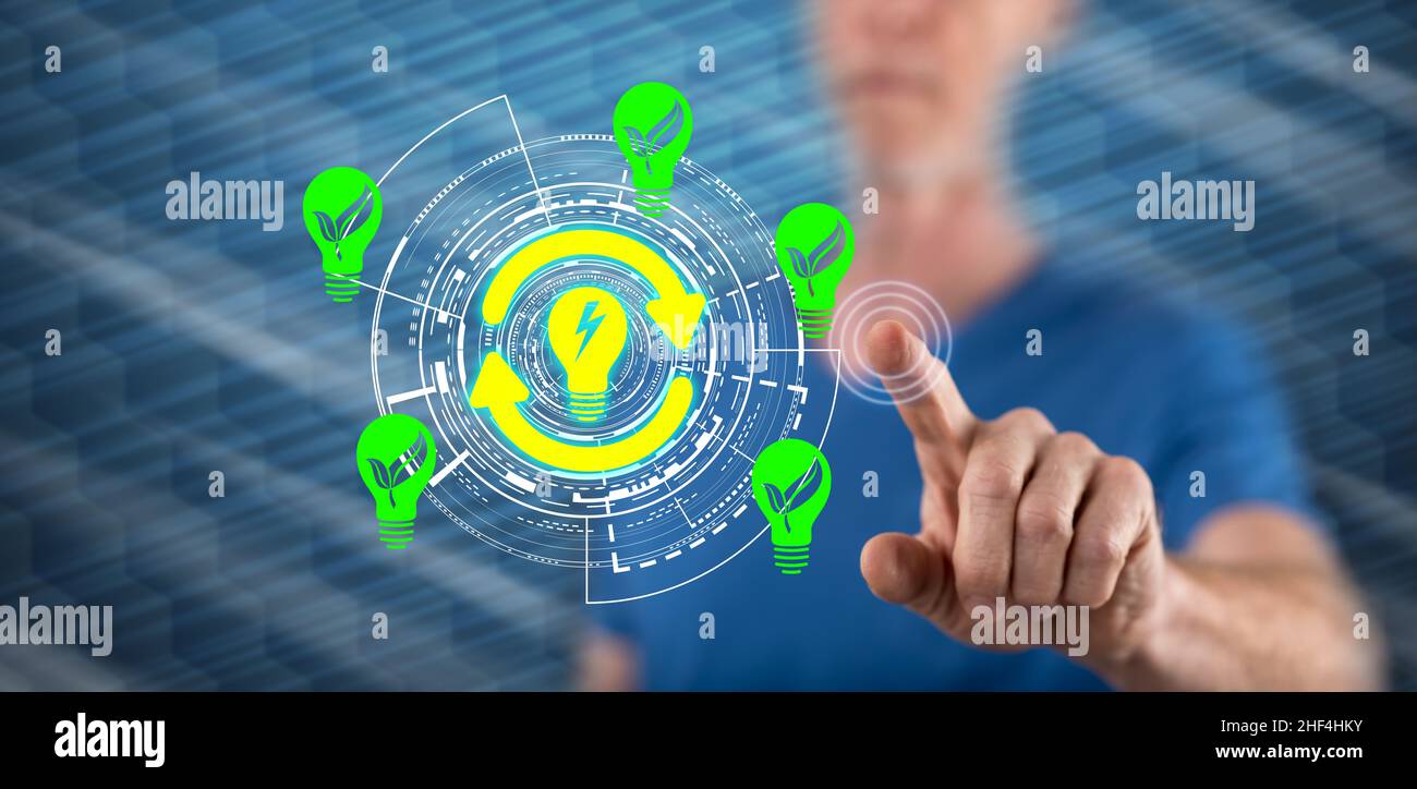 Man touching a renewable energy concept on a touch screen with his ...