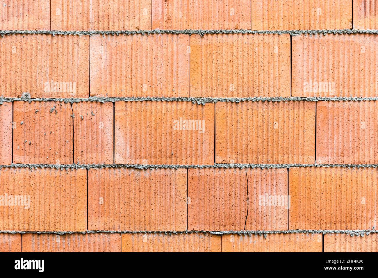 red bricks from construction site in harmonic rows Stock Photo - Alamy
