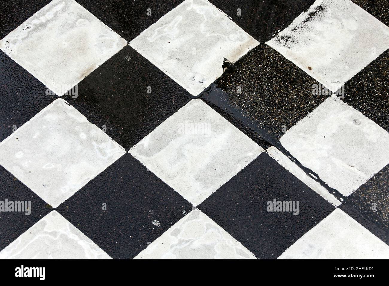 black and white pattern od squares at the street for pedestrian ...
