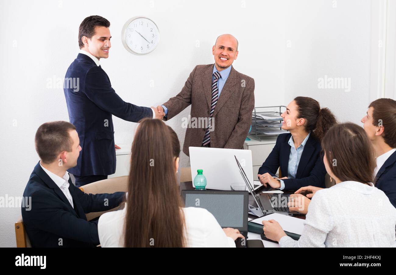 Business handshake at office meeting Stock Photo - Alamy