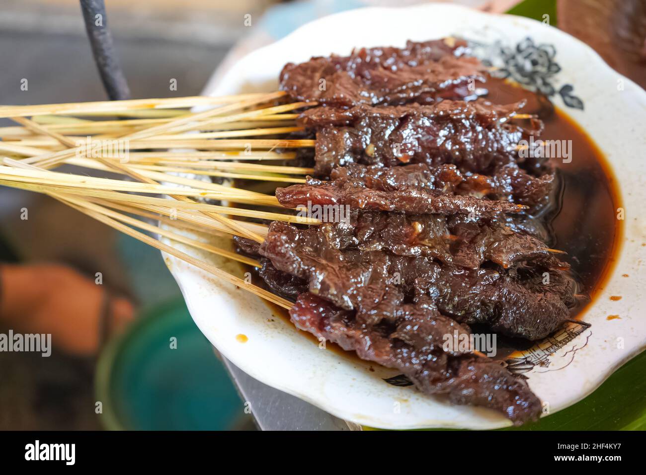 Buffalo satay is a traditional food from Kudus, Central Java, Indonesia ...
