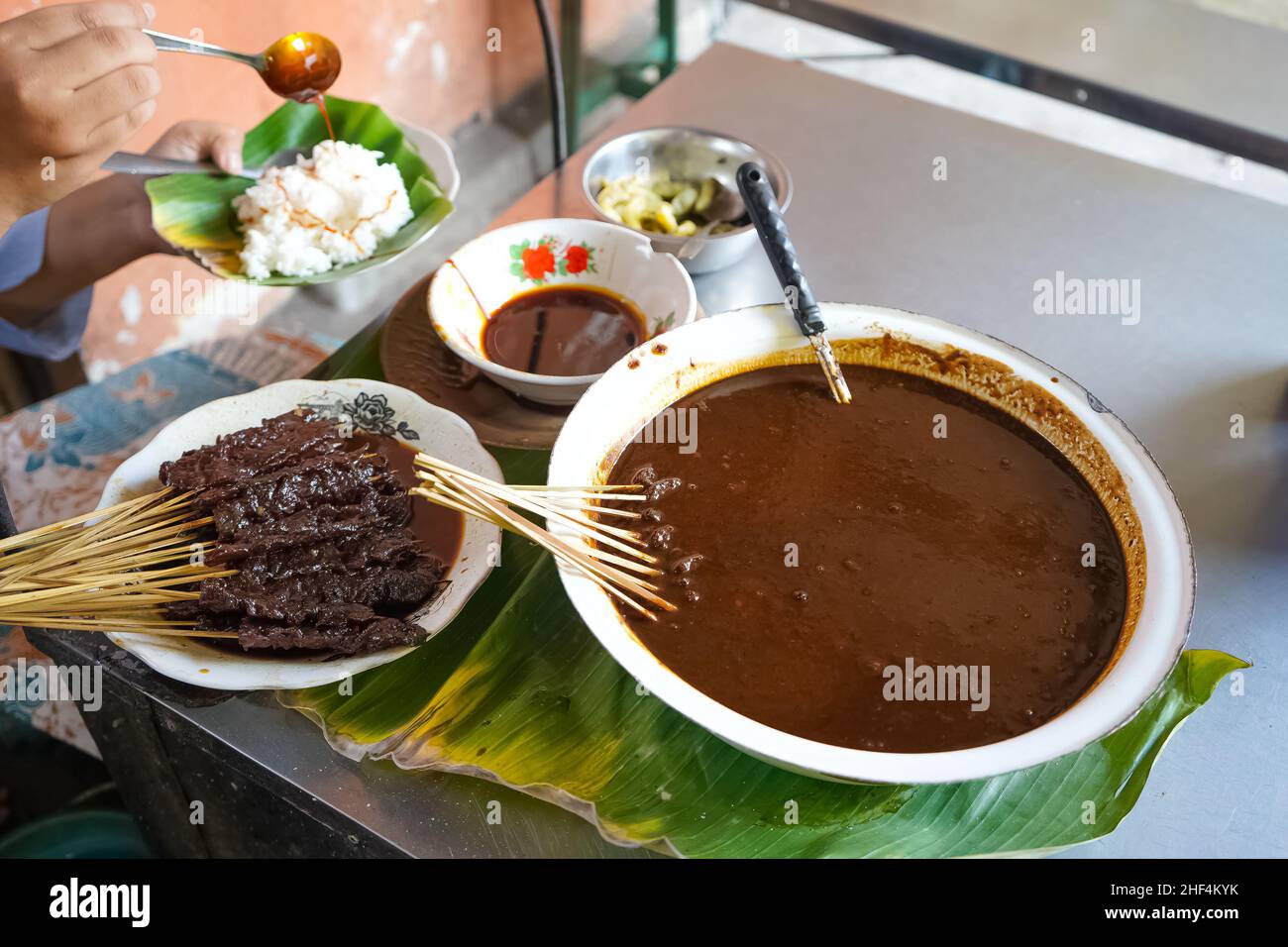 Buffalo satay is a traditional food from Kudus, Central Java, Indonesia ...