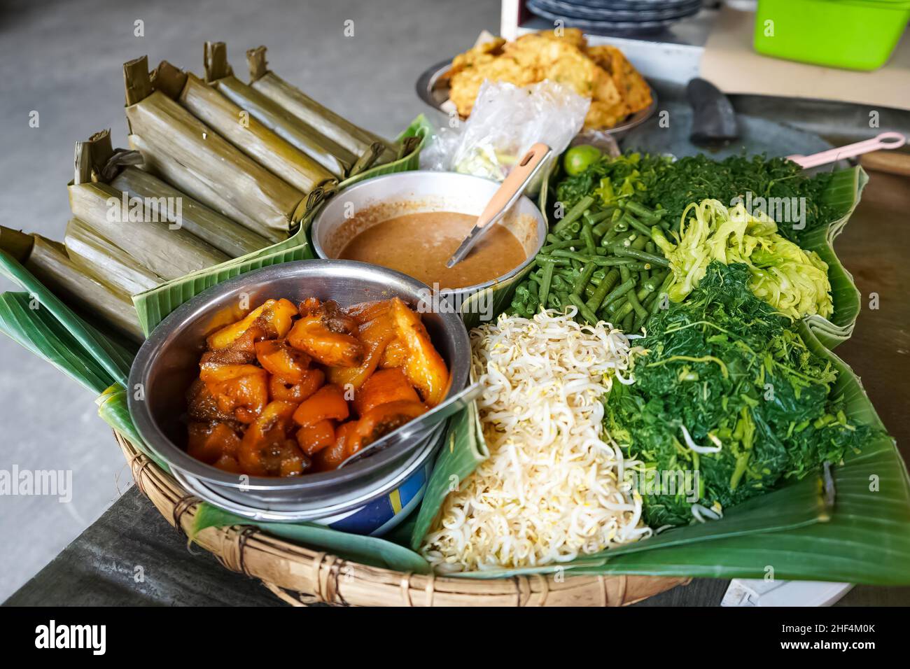 Vegetable pecel is a traditional food, especially in East Java. With a ...