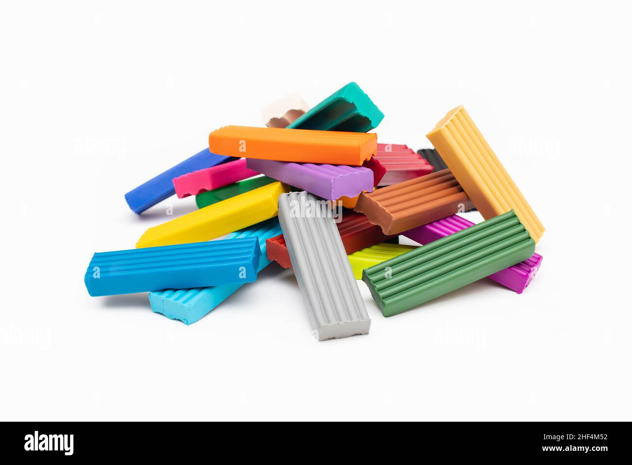Colorful plasticine modelling clay sticks isolated on white background ...