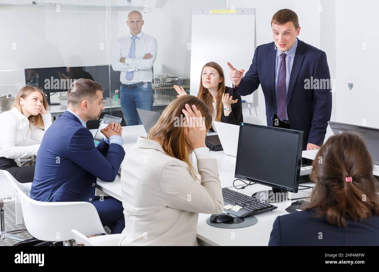 chief scolding fellow workers Stock Photo - Alamy