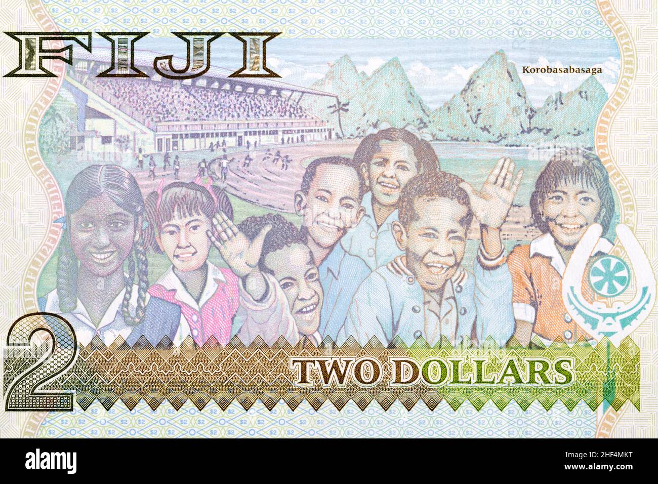 School children and Mt Uluinabukulevu mountain from Fijian money Stock ...